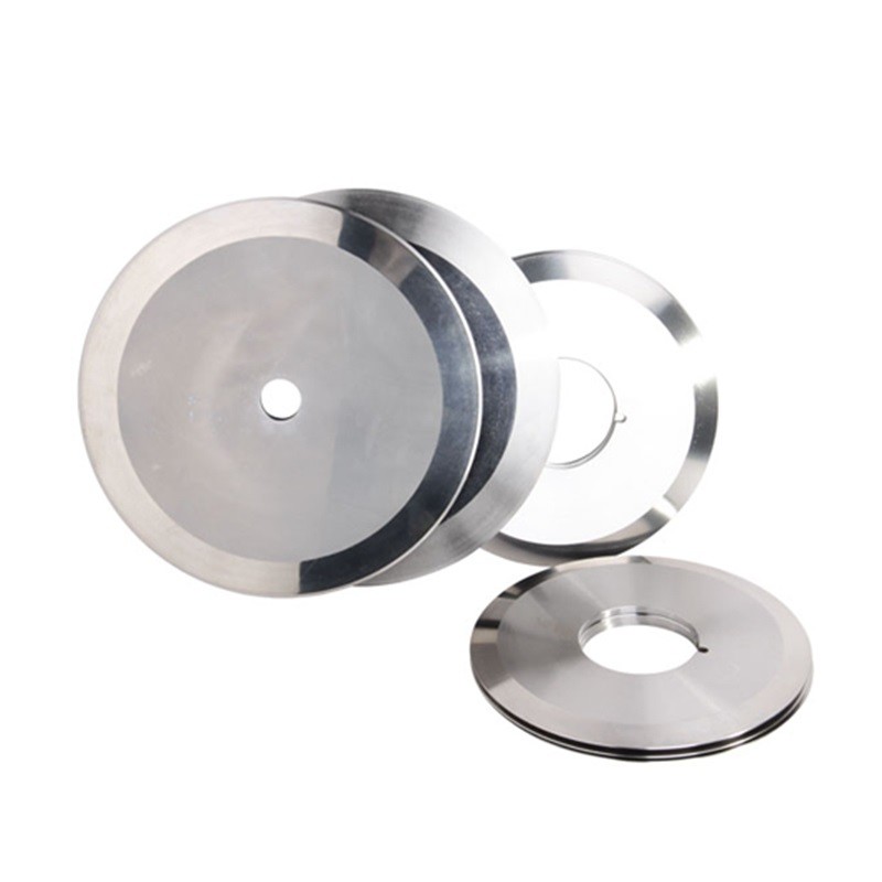 Cigarette filter cutting blades